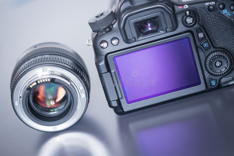 Professional Photographing: Back View of a Professional Reflex Camera ...