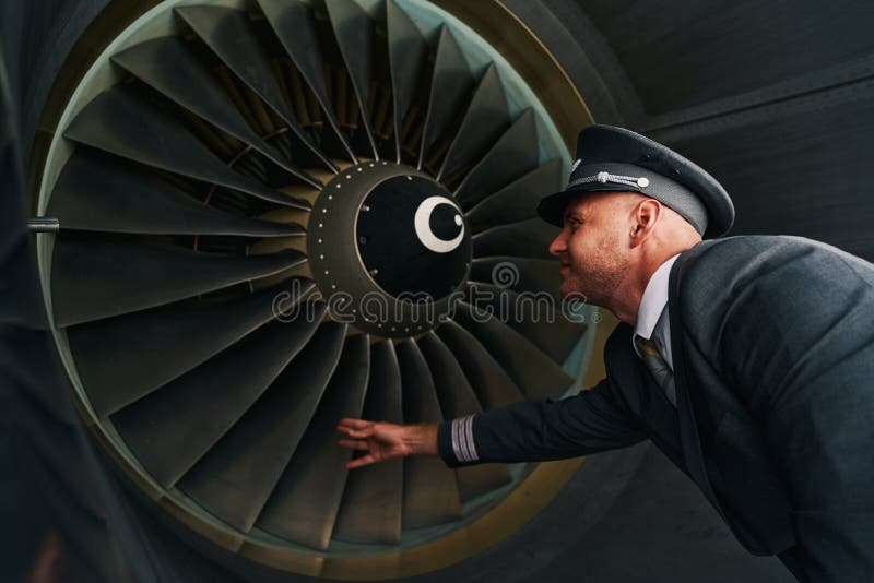 Professional Pilot Checking the Turbofan Engine before the Take-off ...