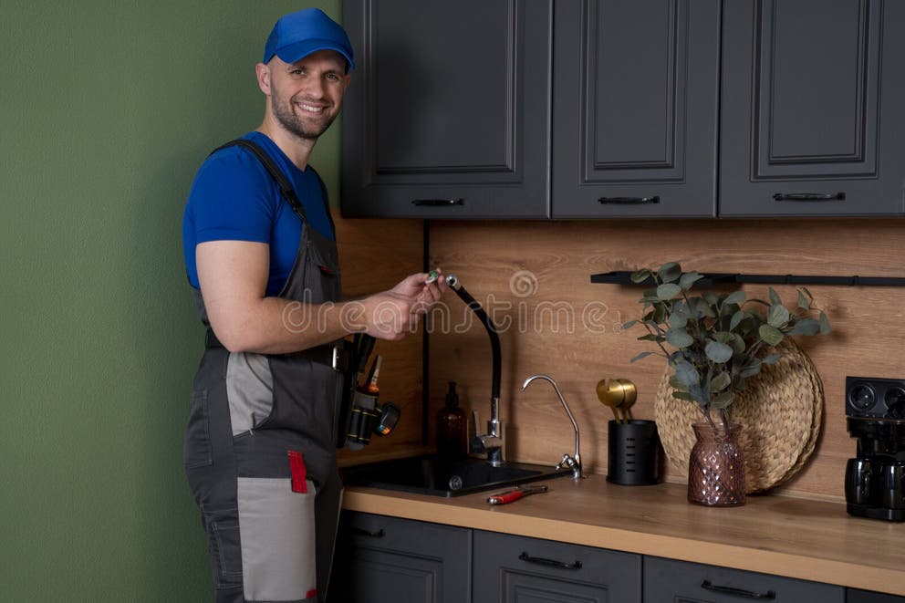 Professional Plumber Fixing Water Tap in Kitchen Stock Image - Image of ...