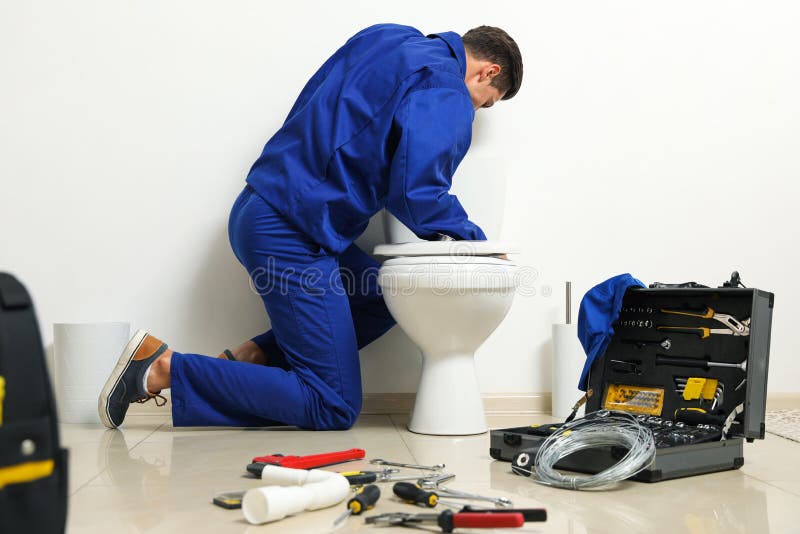 Professional Plumber Working with Toilet Bowl Stock Image - Image of ...