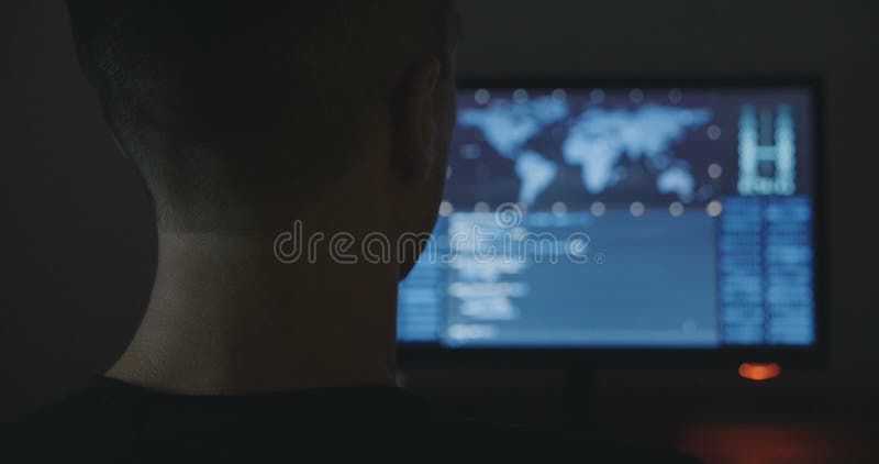 It Professional Hacker Programmer is Working on Computer in Cyber Security Center at Night Stock ...