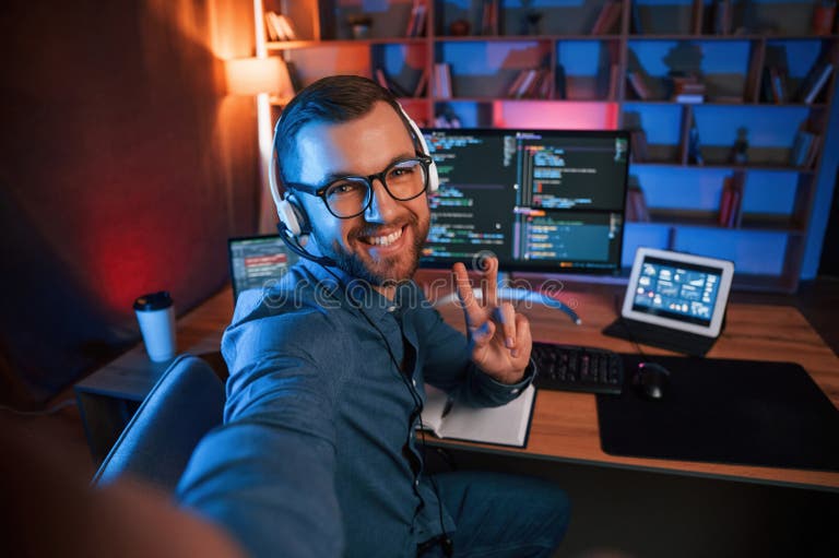 Professional Programmer is Working Indoors. Neon Lighting Stock Image ...