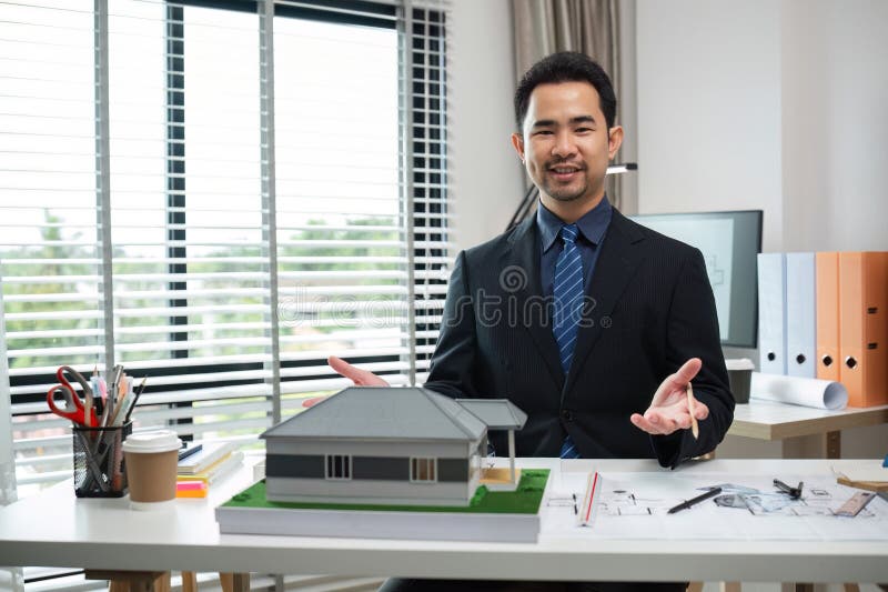 Professional Real Estate Project Sales Representative in Modern Office ...