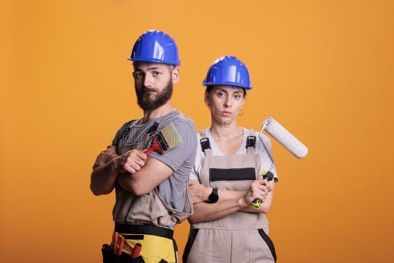 Professional Renovators Posing with Painting Tools Stock Image - Image of redecorate, people ...