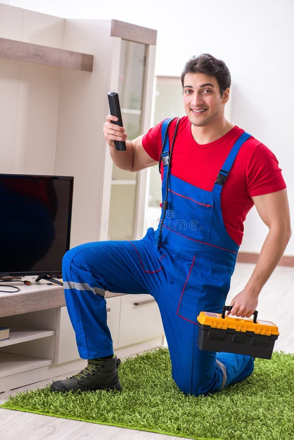 The Professional Repair Engineer Repairing Broken Tv Stock Photo ...