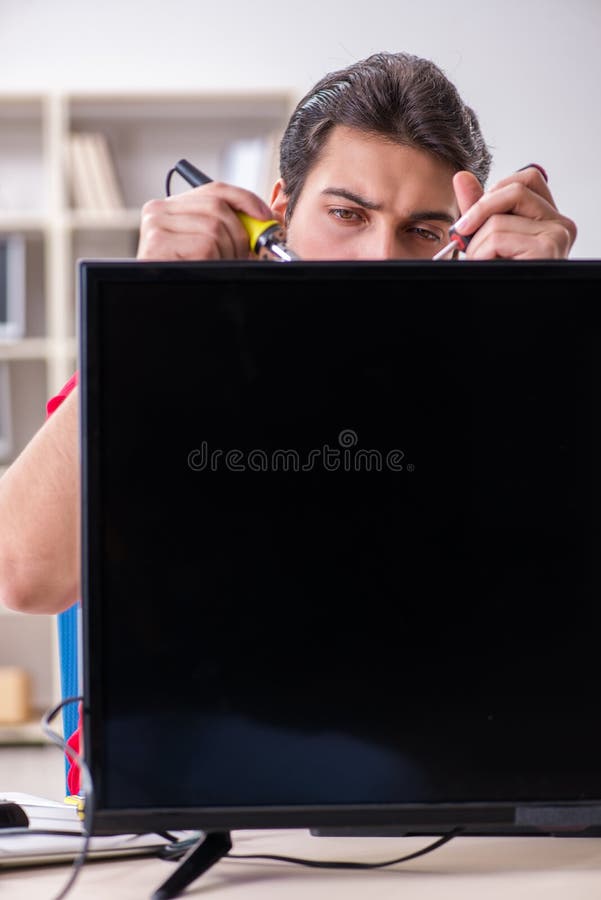 The Professional Repair Engineer Repairing Broken Tv Stock Photo ...