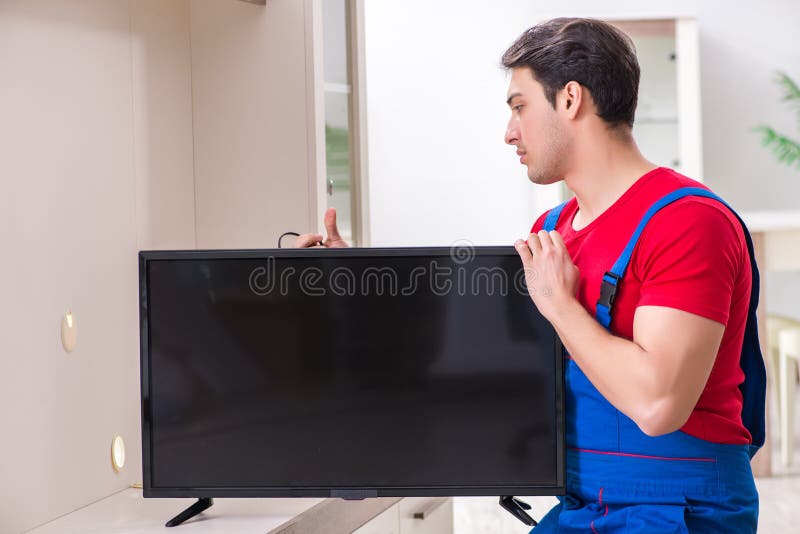 The Professional Repair Engineer Repairing Broken Tv Stock Image ...