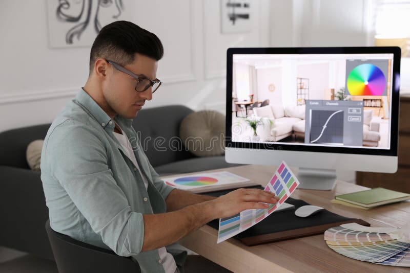Professional Retoucher Working on Computer in Office Stock Photo ...