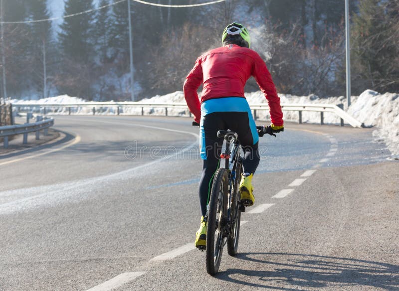 Professional Road Bicycle Racer in Action at Dawn of the Day Stock ...