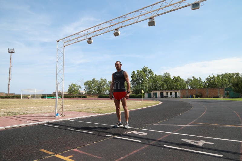 Professional Runner Getting Ready with Jumps Stock Image - Image of ...