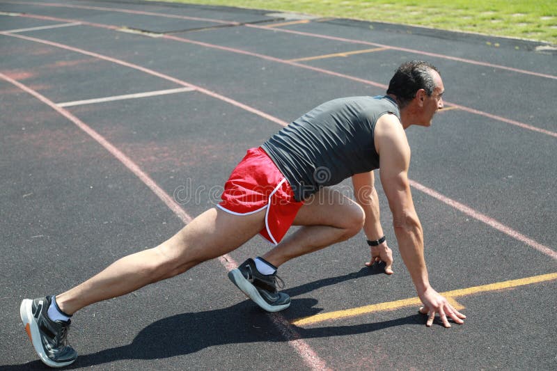 The Body of a Professional Runner Stretching Stock Photo - Image of ...