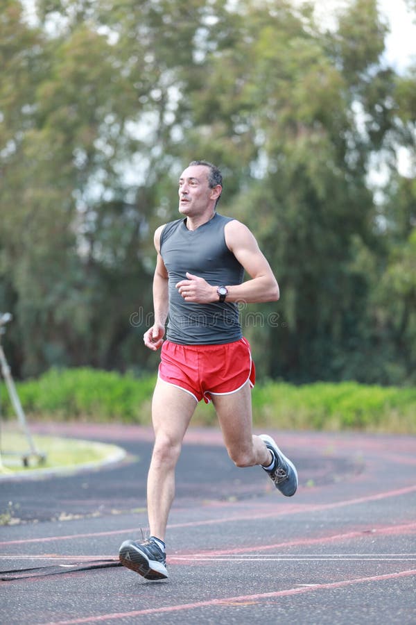 Determination of an Athlete Making a Run Training Stock Photo - Image ...