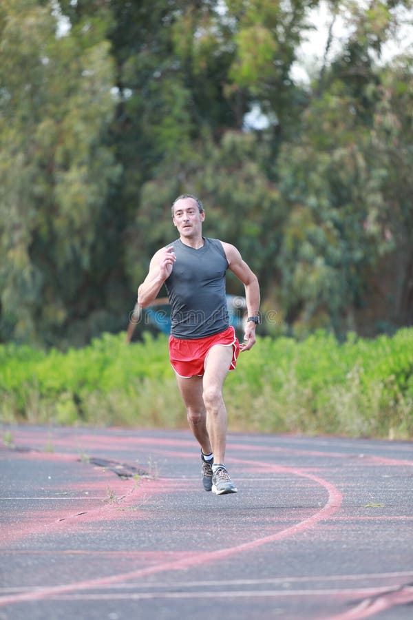 Determination of an Athlete Making a Run Training Stock Photo - Image ...