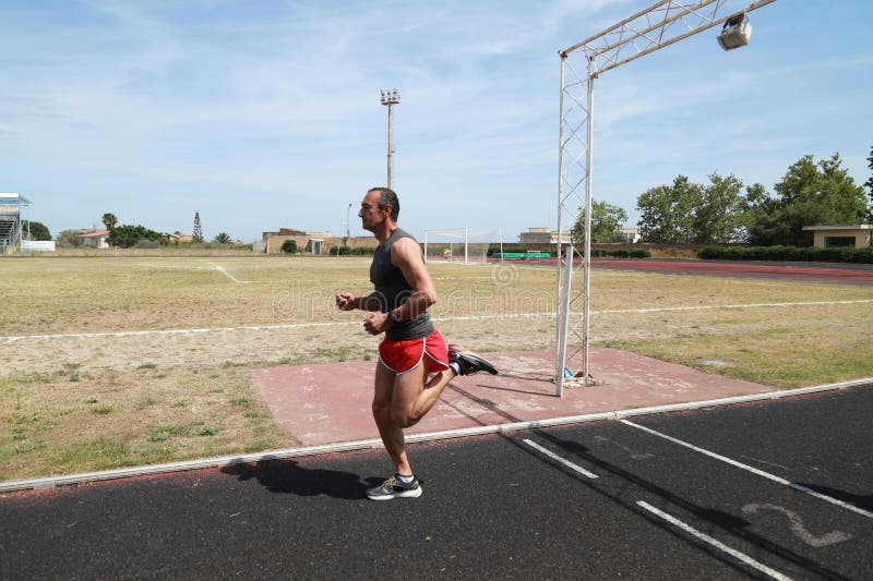 Fit Runner Sprinting on the Track Stock Image - Image of healthy, legs ...
