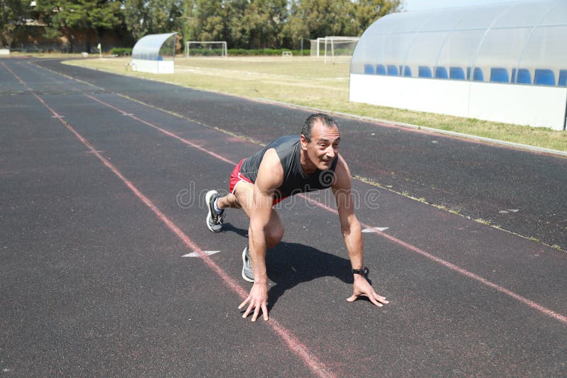 Leg Stretching after the Run Effort Stock Image - Image of active ...