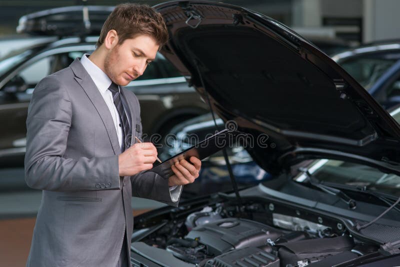 Professional Sale Assistant Working in Auto Show Stock Photo - Image of ...