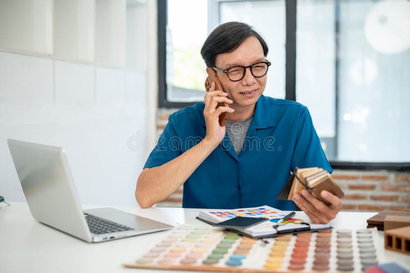 Male Interior Designer Expert Showing Color Palette while Helping ...