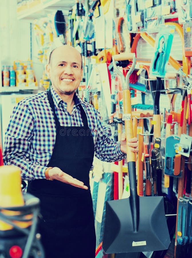Professional Senior Salesman Offering Garden Tools Stock Photo - Image ...