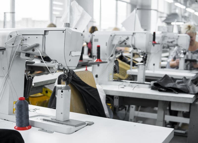 Professional Sewing Machine with Black Thread on a Shoes Factory. Stock ...