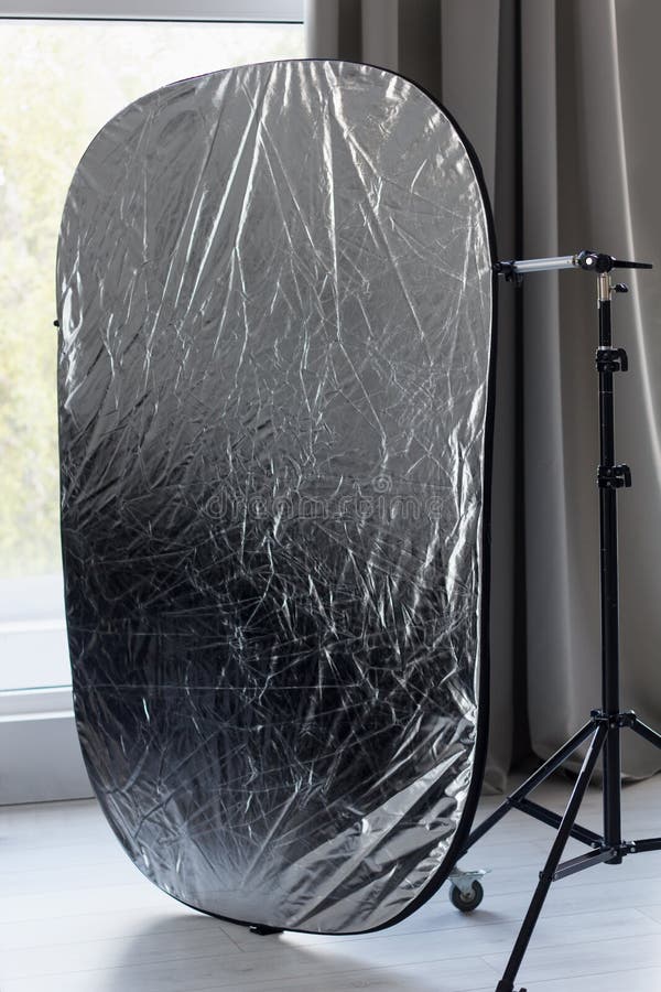 Professional Silver Reflector Mounted on Stand in a Photo Studio Stock ...