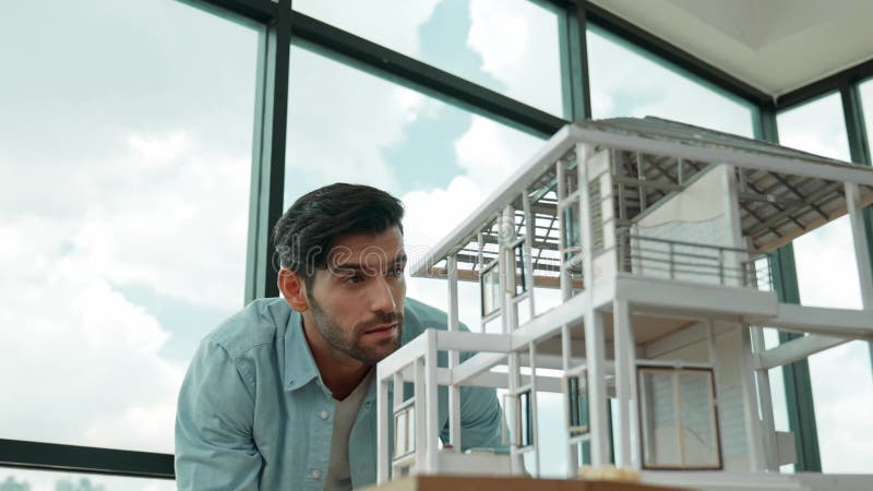 Professional Smart Engineer Standing while Looking at House Model ...