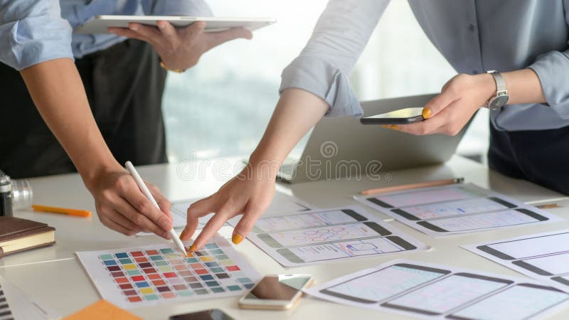 Professional Smartphone Application Design Team Designing a New Project ...