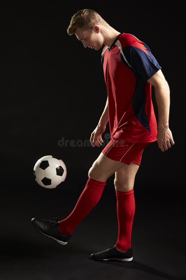Professional Soccer Player Controlling Ball in Studio Stock Photo ...