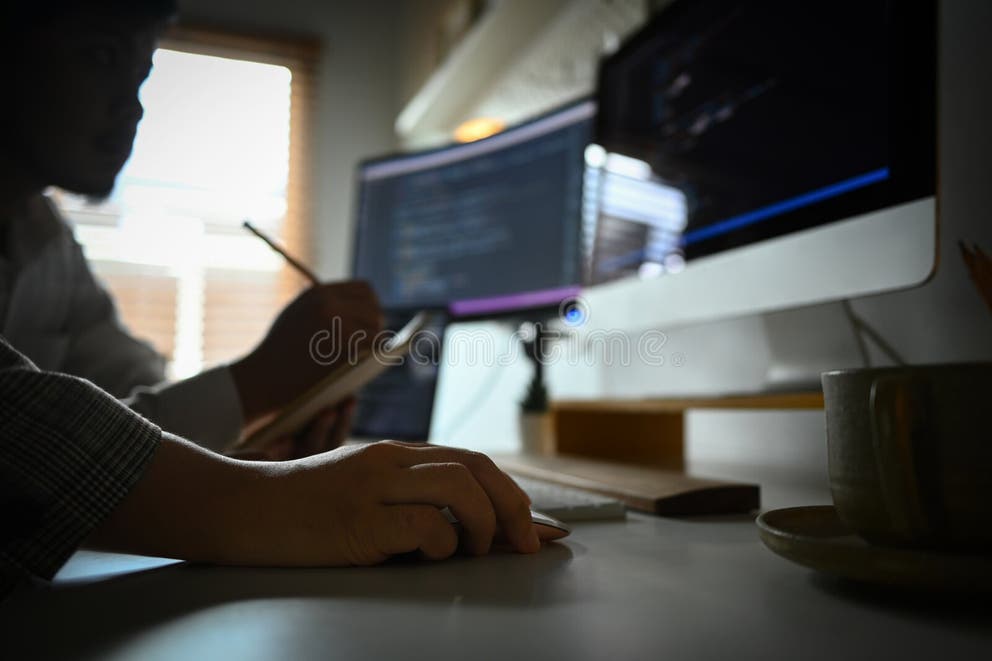 Professional Software Developers Working on a New Project, Writing Program Code on Computer in ...