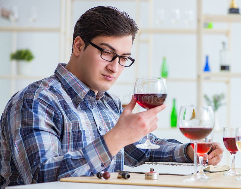 Professional Sommelier Tasting Red Wine Stock Photo - Image of holding ...