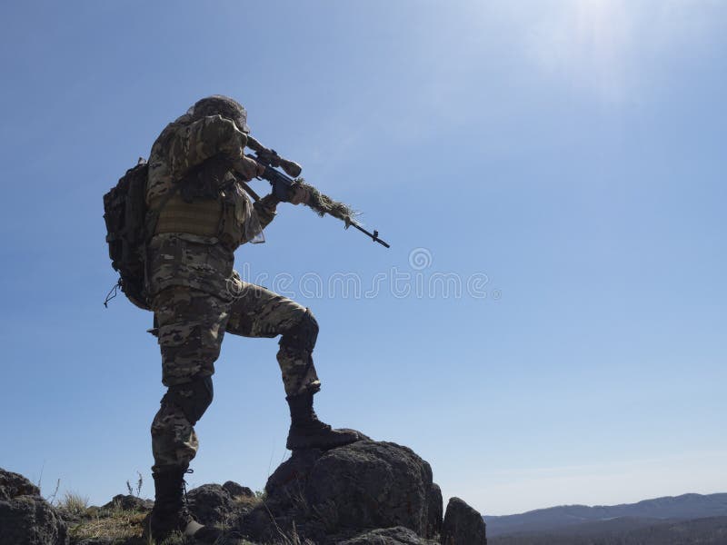 Professional Special Forces Sniper during a Special Operation - he Aims ...