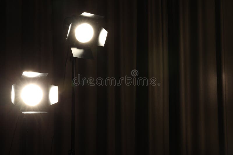 Professional Spotlights Against Curtain. Space for Text Stock Photo ...