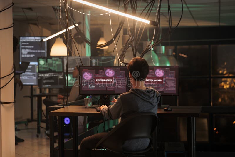 Professional Spy Breaking into Computer System and Hacking Bank Account ...