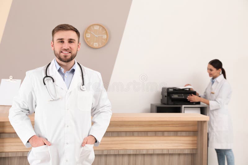 Professional Staff Working at Reception Stock Image - Image of male ...