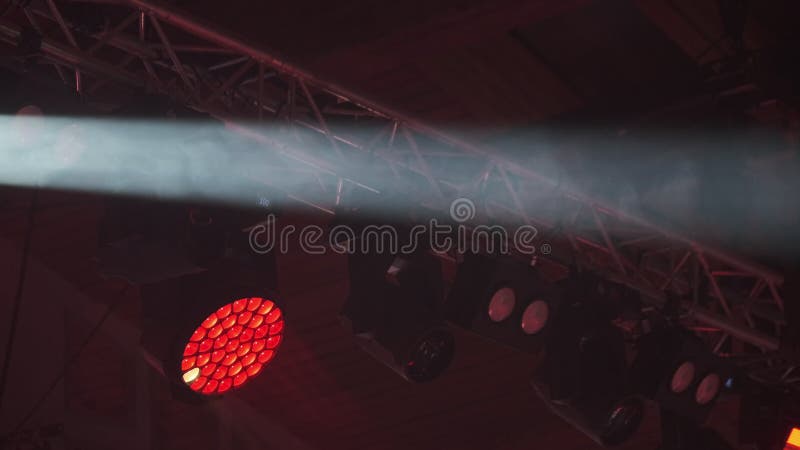 Stage Lighting Equipment with Beams of Light during a Performance Setup ...