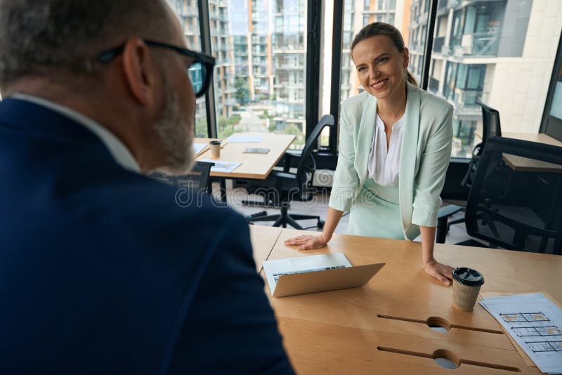 Professional Supervisor Smiling and Standing in Front of Office Partner ...