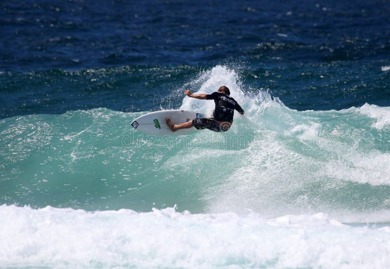 Professional surfer editorial image. Image of exercise - 14311830