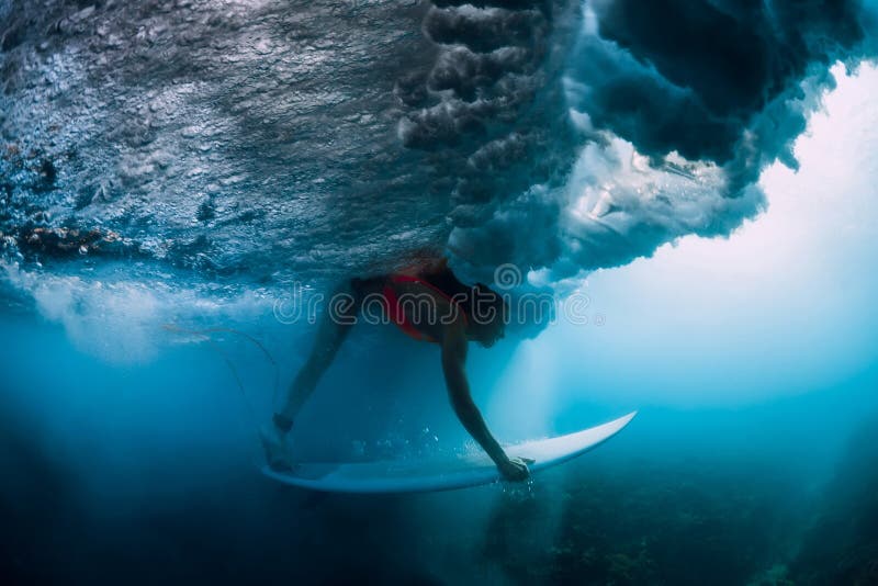 Professional Surfer Woman with Surfboard Dive Under Wave Stock Image ...