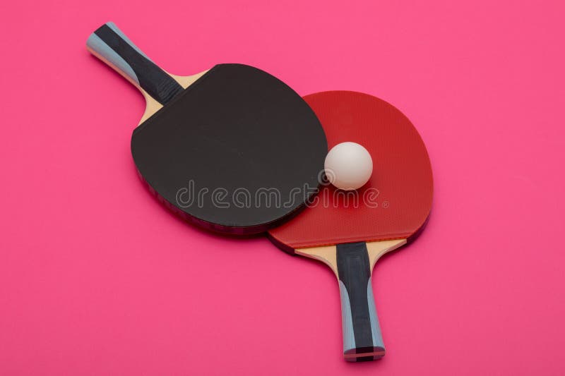 Professional Table Tennis Paddles and Ball on Pink Background Stock ...