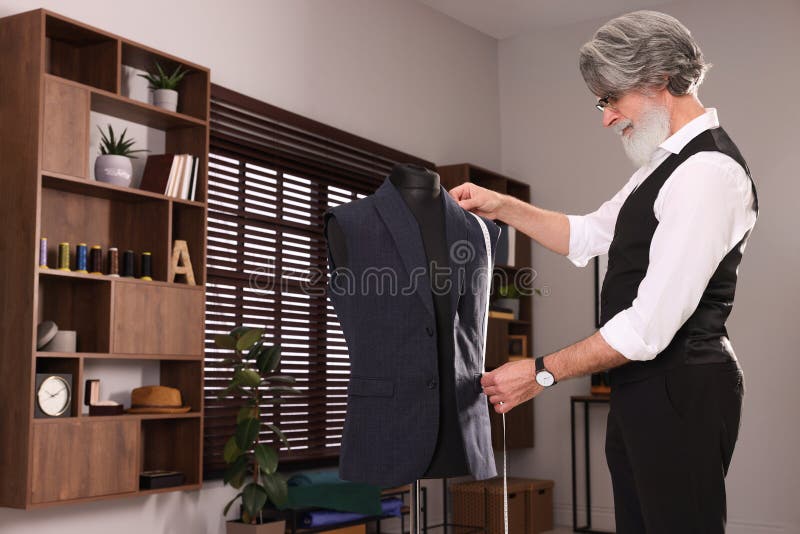 Professional Tailor with Measuring Tape Working in Atelier, Space for ...