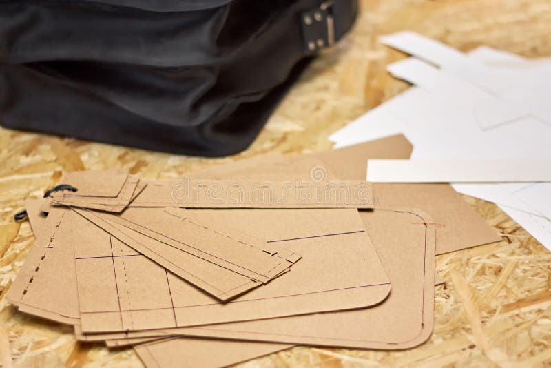 Professional Tailor Paper Template Set on the Bench in the Workshop ...