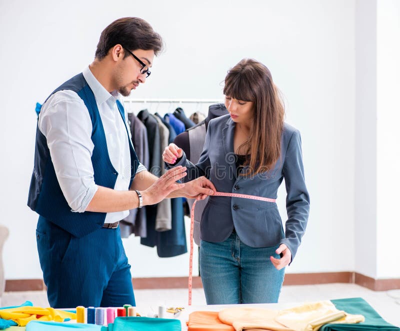 Professional Tailor Taking Measurements for Formal Suit Stock Photo ...