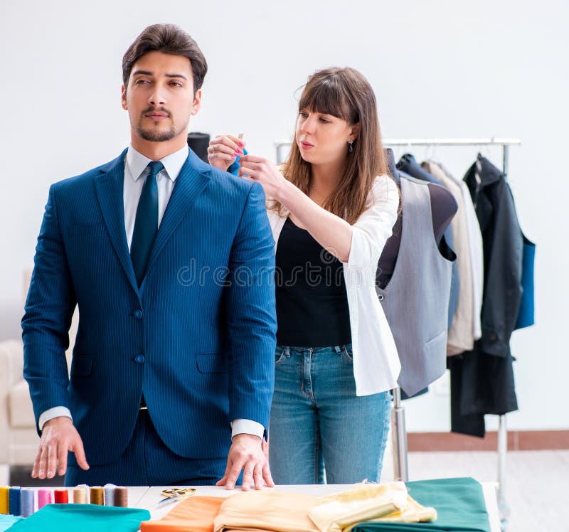 Professional Tailor Taking Measurements for Formal Suit Stock Photo ...