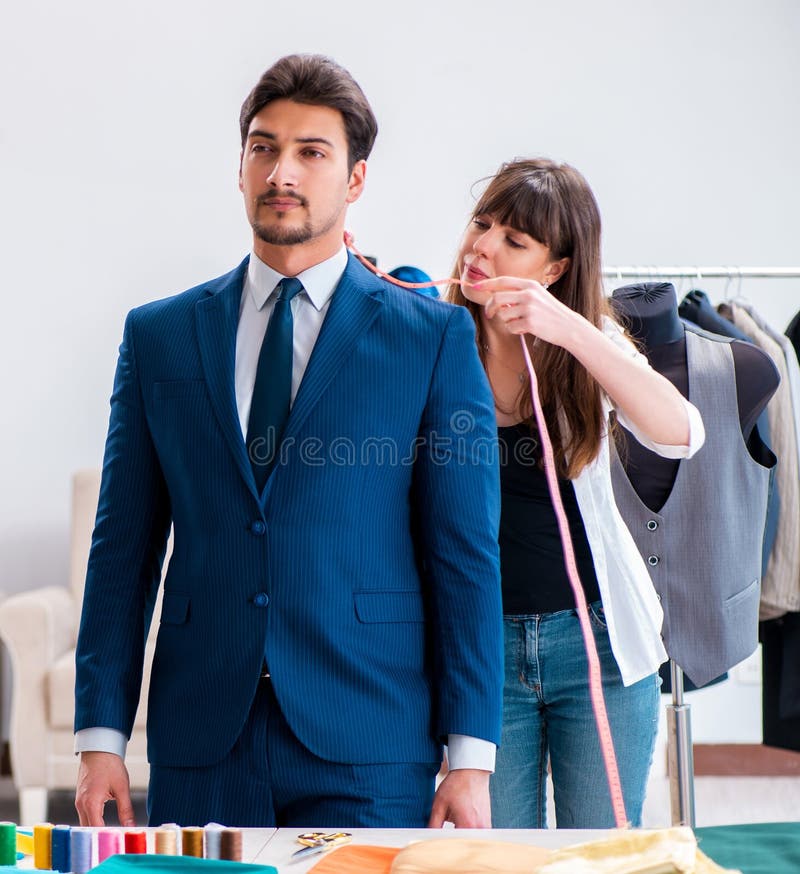 Professional Tailor Taking Measurements for Formal Suit Stock Photo ...