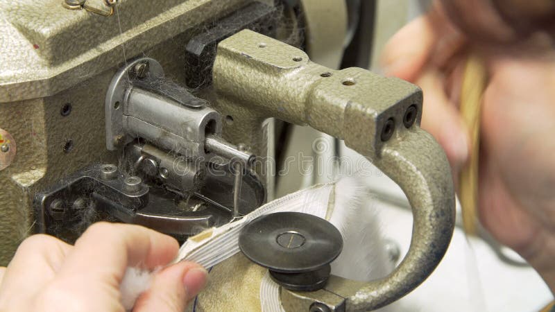 Professional Tailor Using Industrial Sewing Machine for Stitching Fur ...