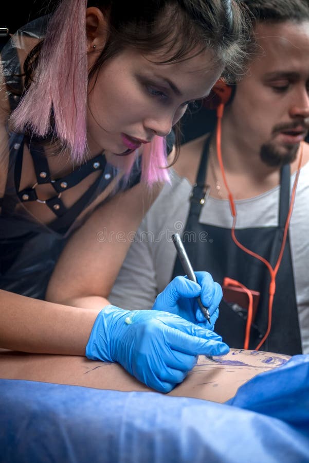 Professional Tattoo Artist Working on Professional Tattoo Machine ... Professional Tattoo Artist Working on Professional Tattoo Machine ...