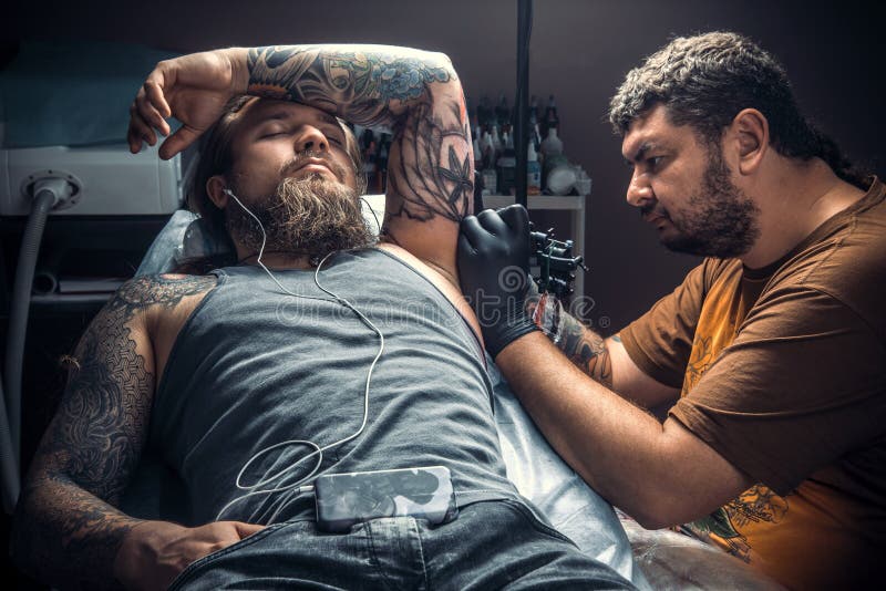 Professional Tattooist at Work in Studio Stock Image - Image of sitting ...