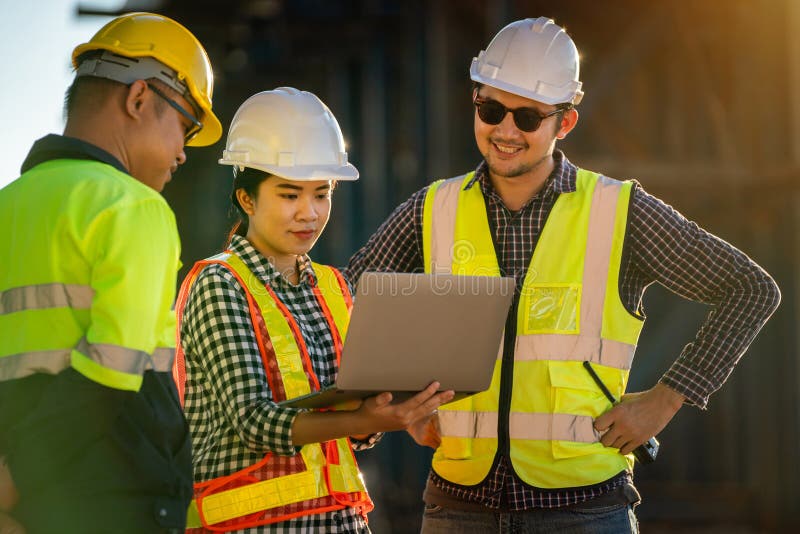 A Professional Team of Architects, Engineers, Foremen Working on ...