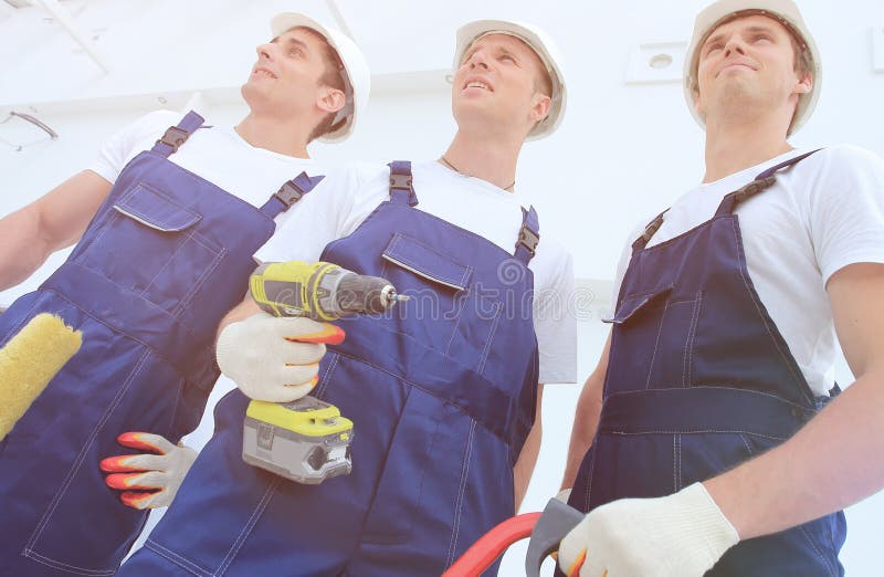 Professional Team of Builders with Tools Stock Photo - Image of helmet ...