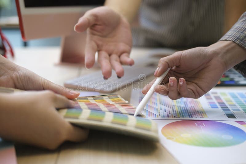 Professional Team of Interior Designers Brainstorming and Discussing ...