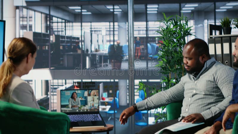 Professional Team Using Video Call Technology To Support Company ...